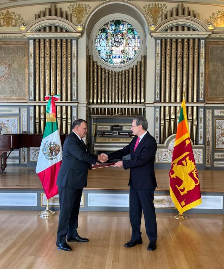 Ambassador Mahinda Samarasinghe presents copies of his letter of ...